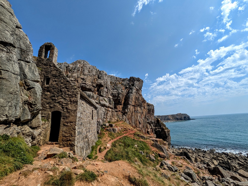 St Govan's Chapel overlooking the sea. - No Home Just Roam
