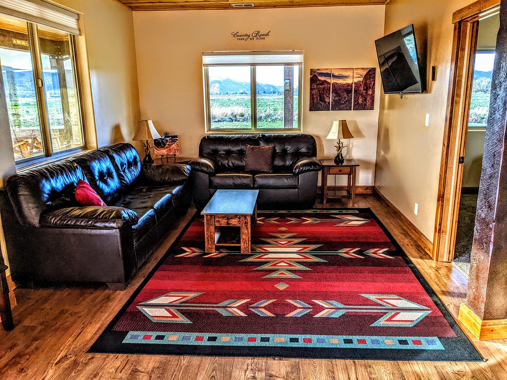 Living room of our Airbnb in Kanab, UT - No Home Just Roam